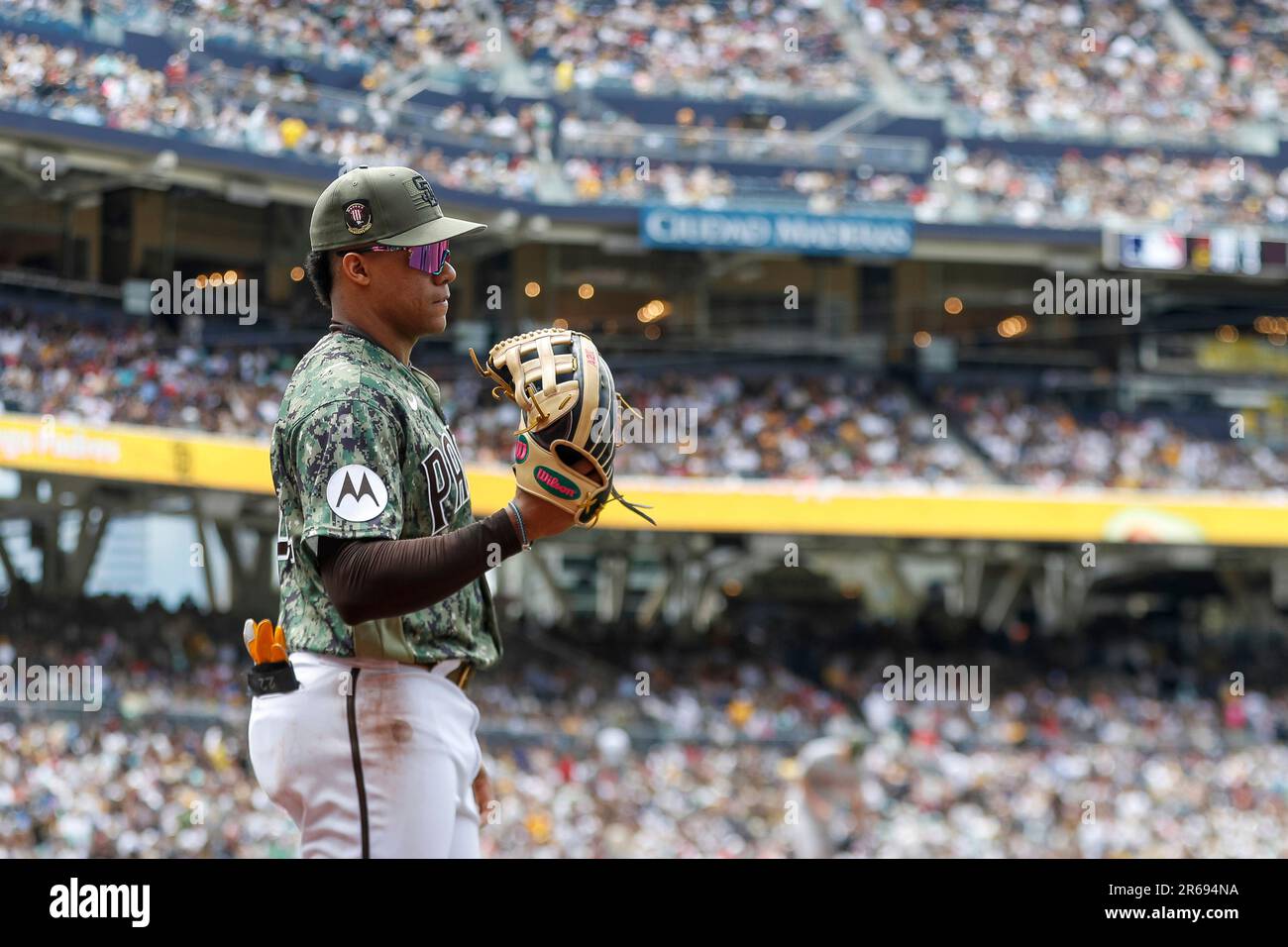 San Diego Padres' Juan Soto stands in front out the dugout during a ...