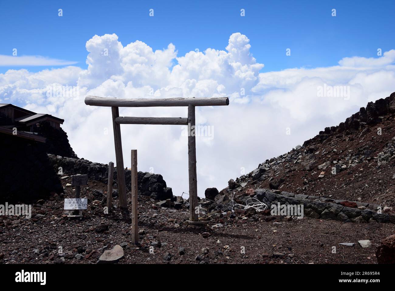 Torii gate and sea of clouds at the summit of Mt. Fuji Gotemba route ...