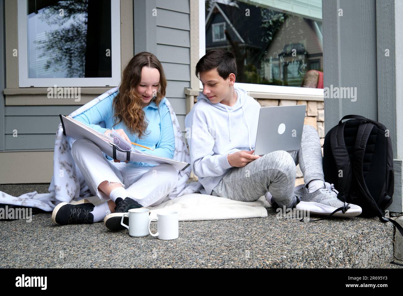 nice to do homework together with a friend boys girl sitting on the ...