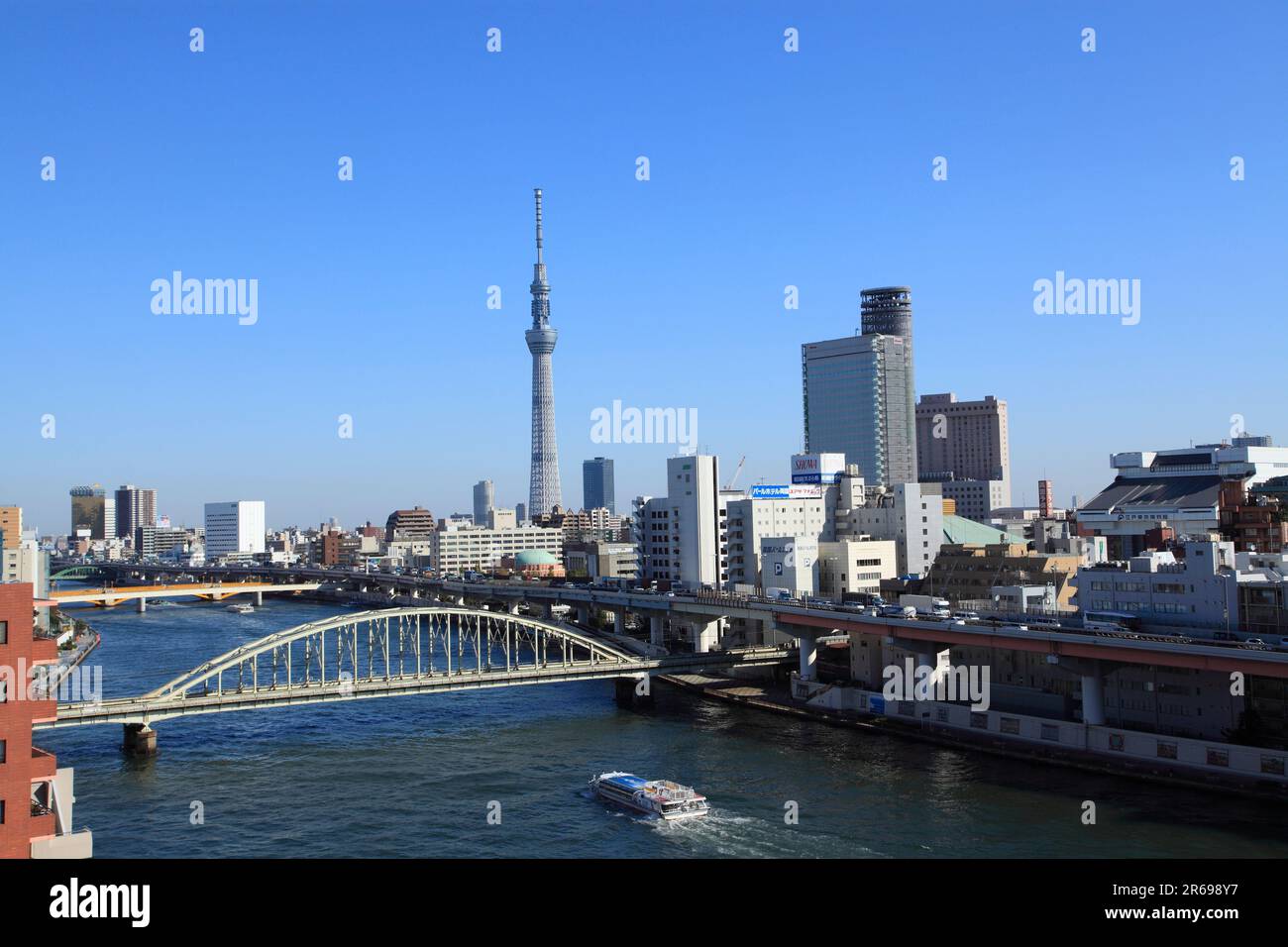 Sobu Line railway bridge and Tokyo Sky Tree Stock Photo - Alamy