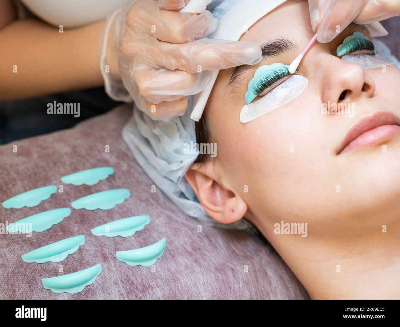Eyelash lamination master removes paint hi-res stock photography and ...