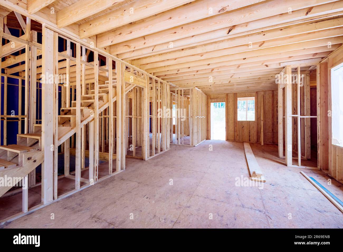 Construction new house involves use of wooden beams as support within ...