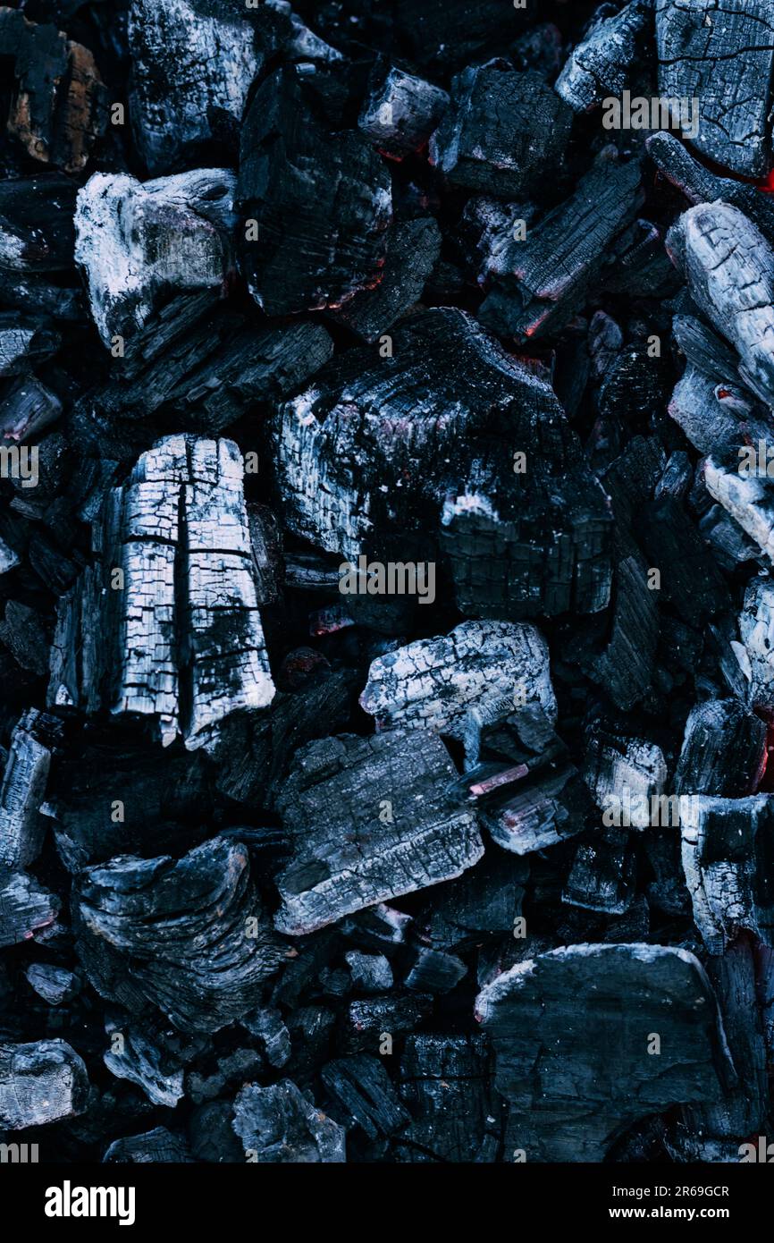 Background of burning hot coals. Burning coals in the brazier, barbecue ...