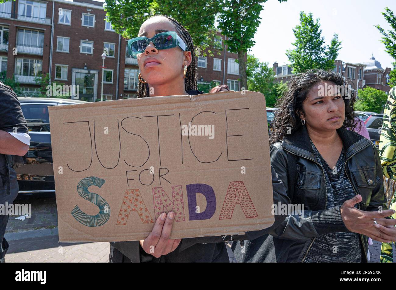 The Hague, 07/06/2023, A protester holds a placard during the Sanda Dia ...