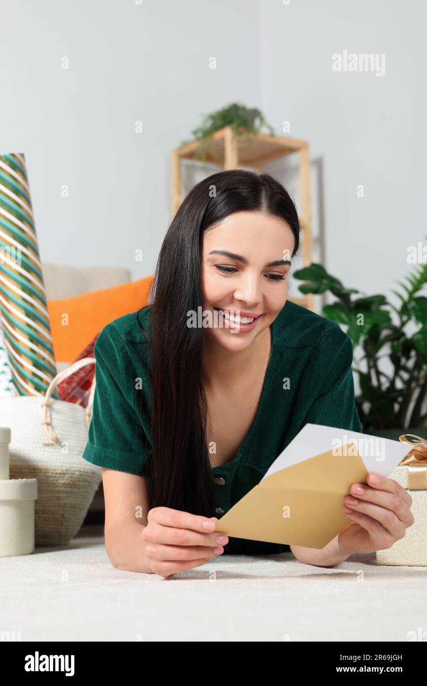 Woman invitation smile envelope hi-res stock photography and images - Alamy
