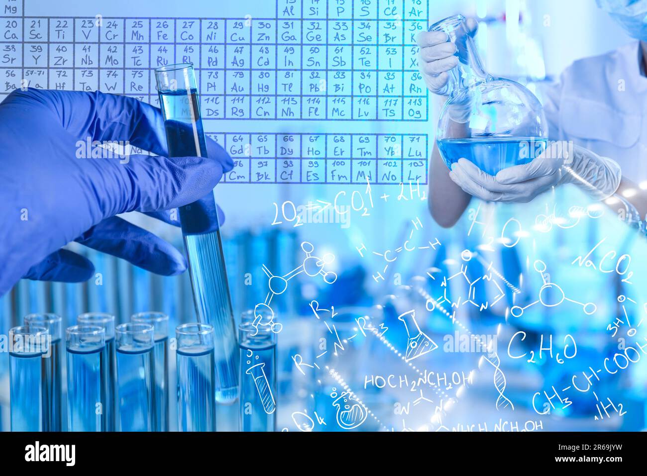 Scientists working with samples, periodic table of elements and ...