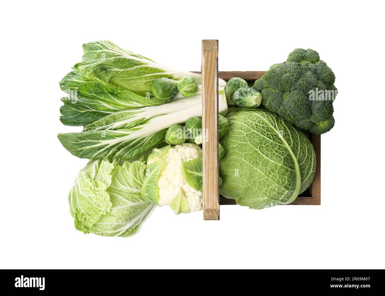 Wooden crate with different types of fresh cabbage on white background ...