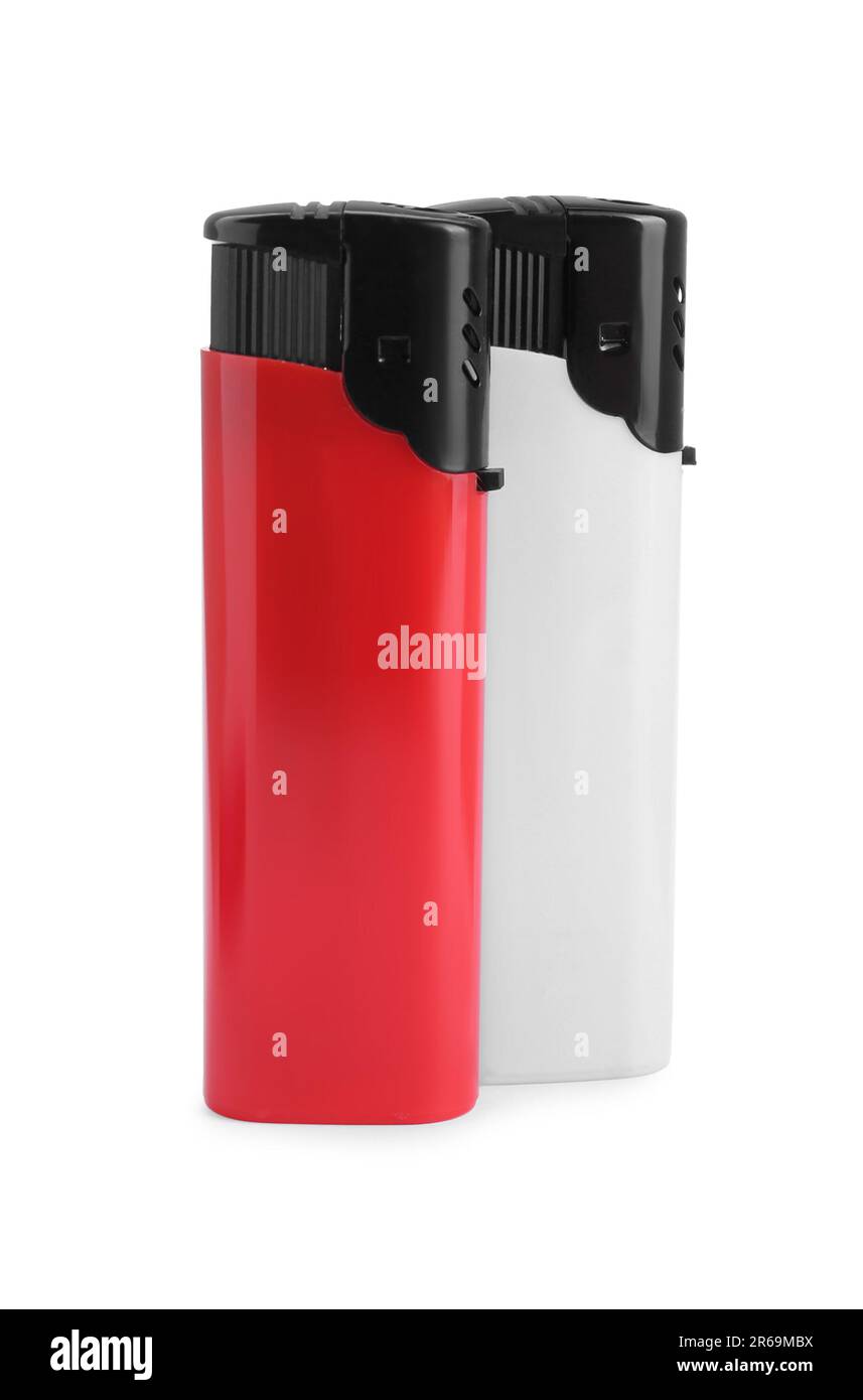 Stylish small pocket lighters on white background Stock Photo - Alamy
