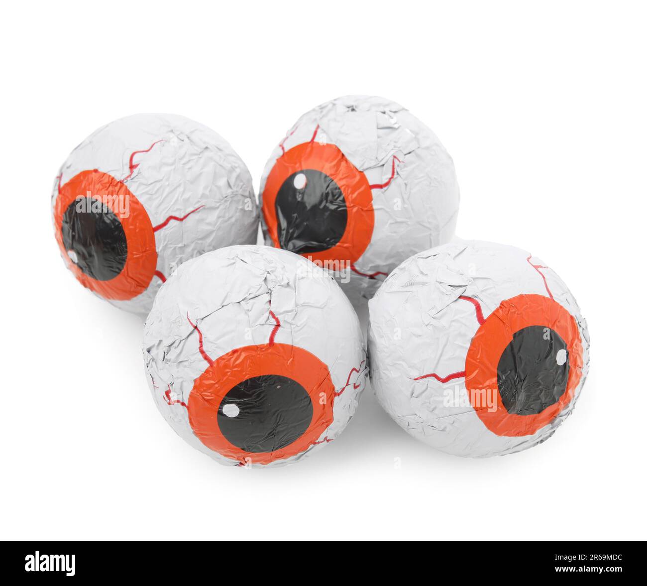 Delicious colorful candies in shape of eyes on white background ...