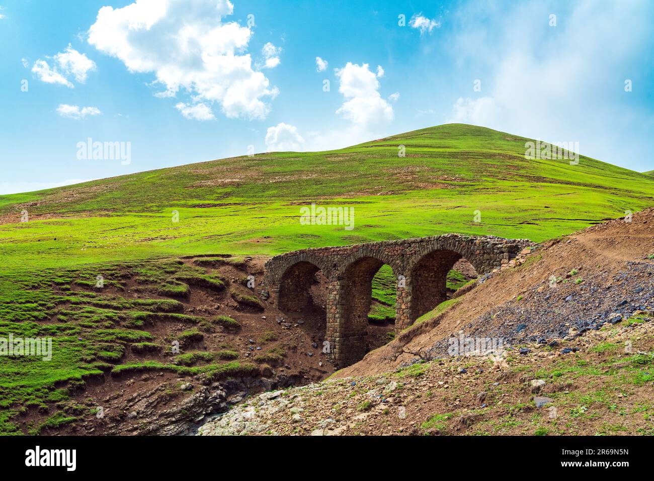 An ancient stone bridge in the suburbs of the city of Gadabay, built by ...