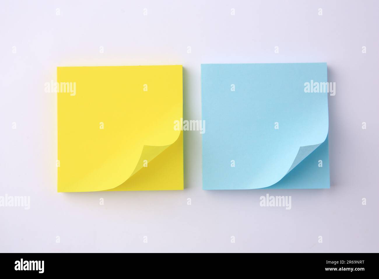 Blank paper notes on white background, flat lay Stock Photo - Alamy