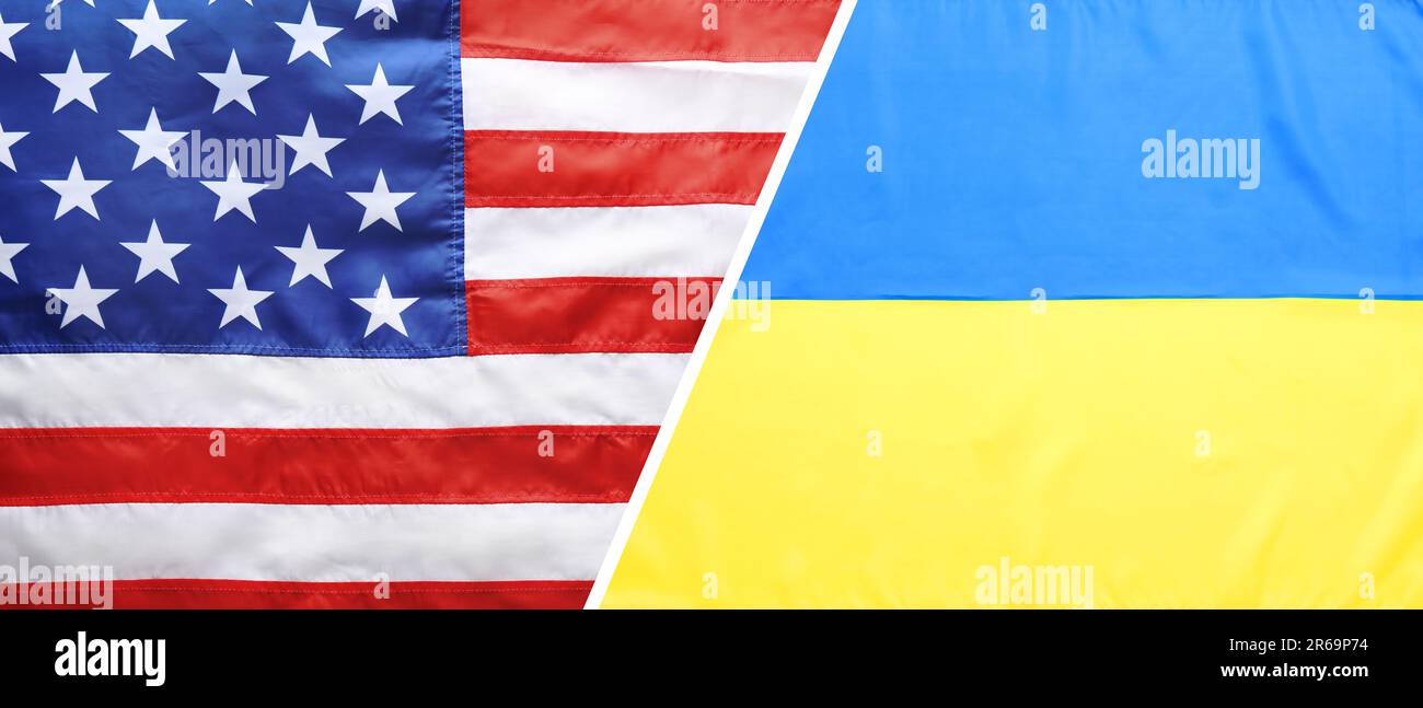 National flags of Ukraine and USA symbolizing partnership between ...