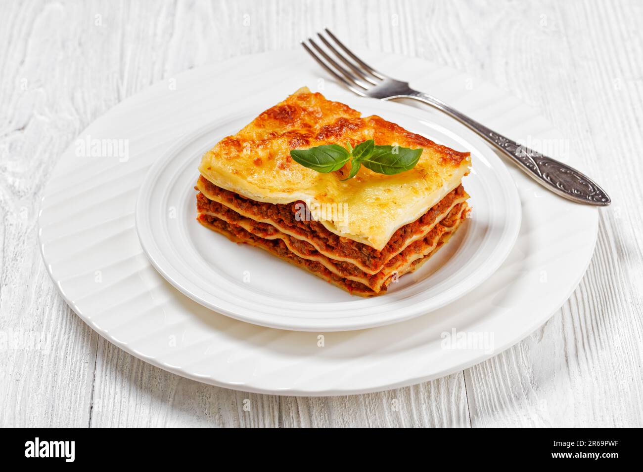 portion of lasagne al forno, italian beef lasagna layered with ground ...