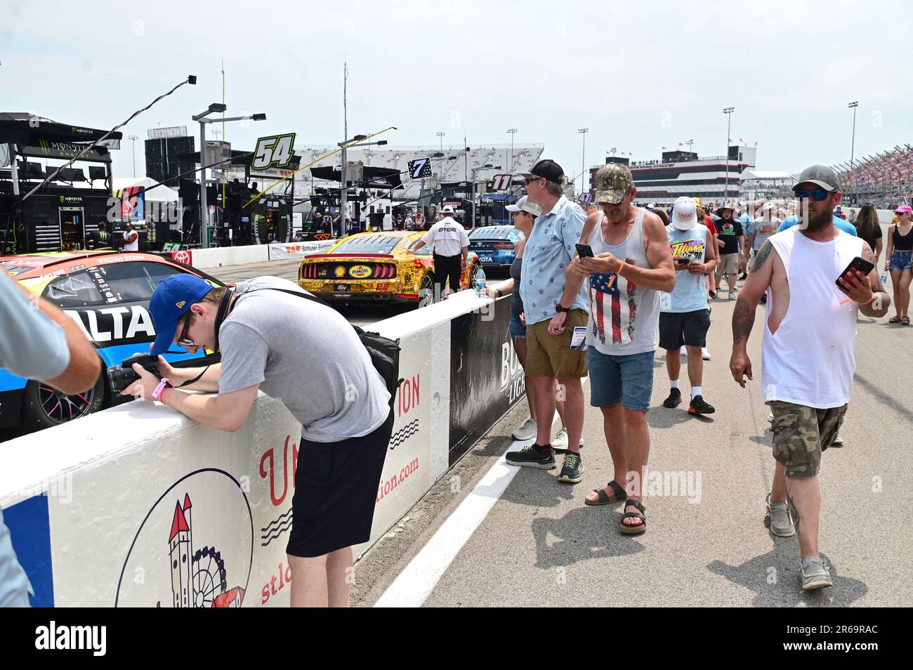 MADISON, IL - JUNE 04: Fans get a close up look at the race cars on pit ...