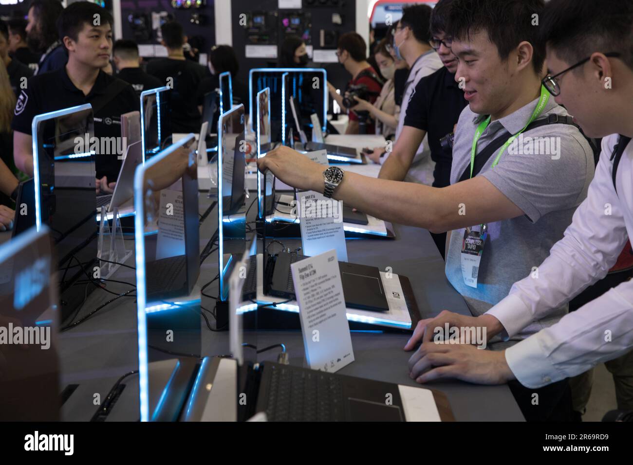 Visitors try MIS notebook at Computex ,a computer and technology trade ...