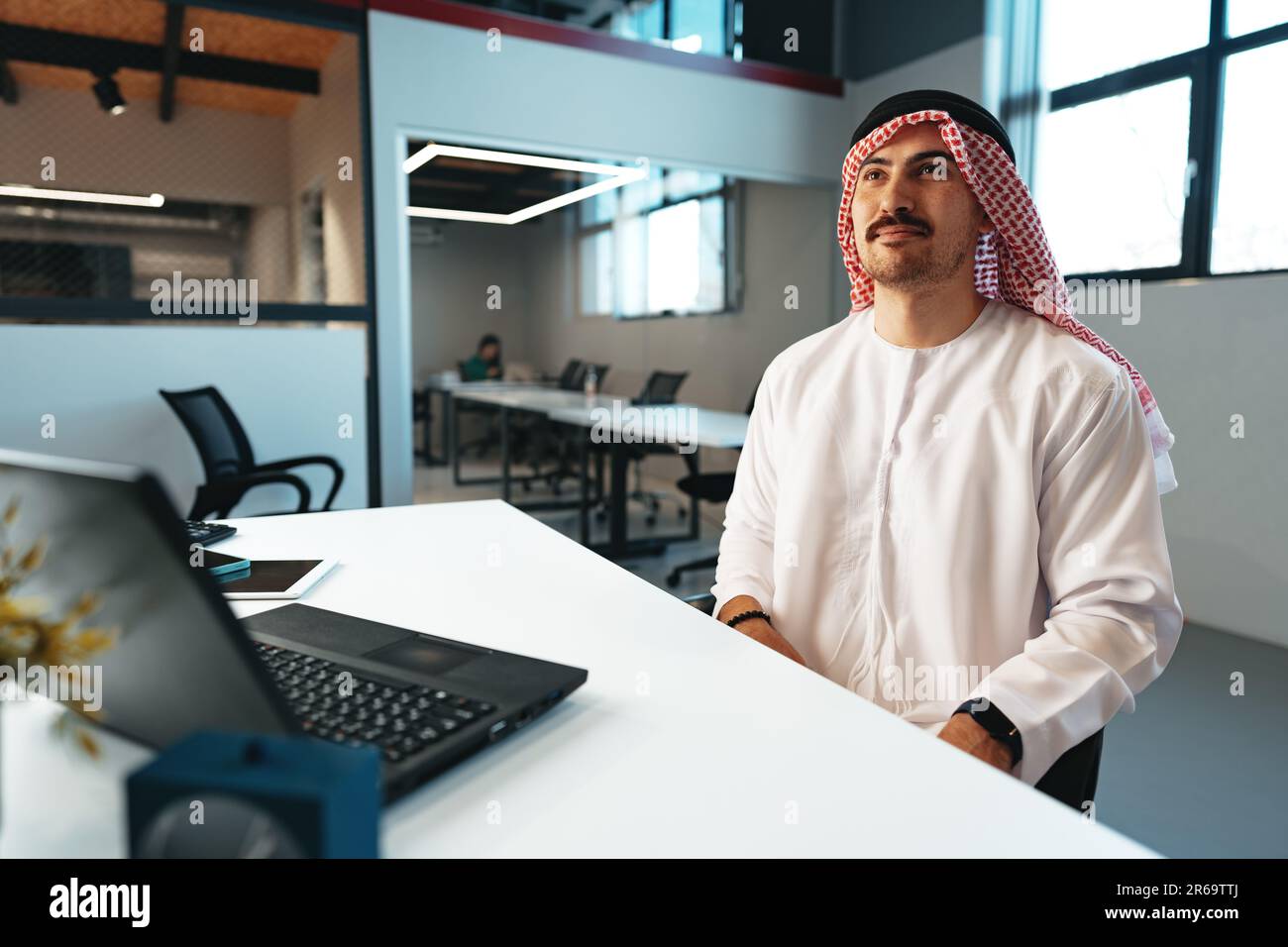 Successful muslim businessmen in traditional outfit in his office Stock ...