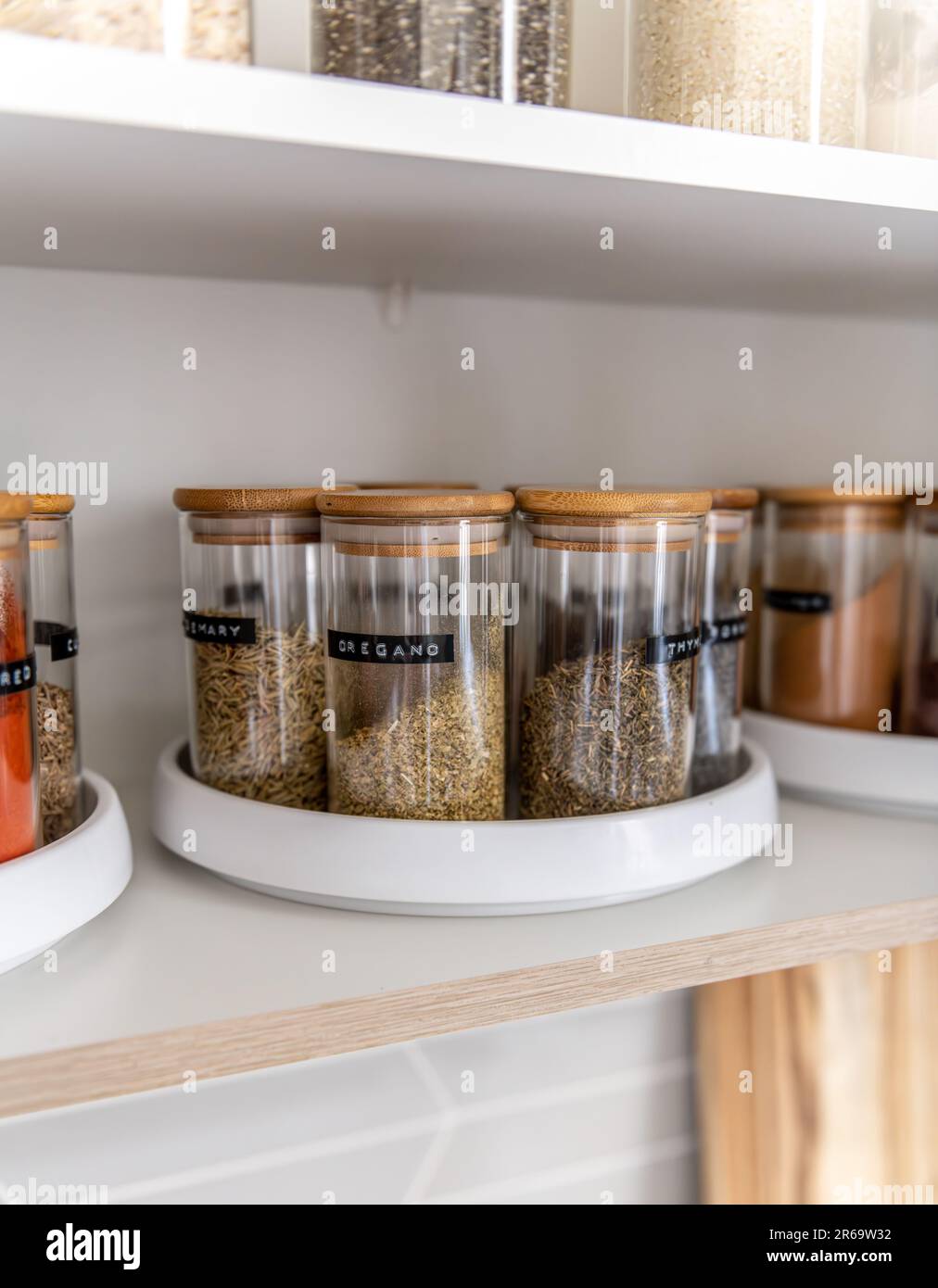 Organized labeled food pantry in a home kitchen with spices Stock Photo ...