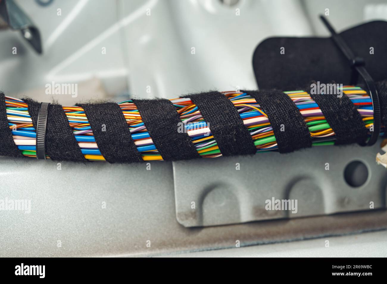 Electric wiring system with colorful wires in the car Stock Photo - Alamy