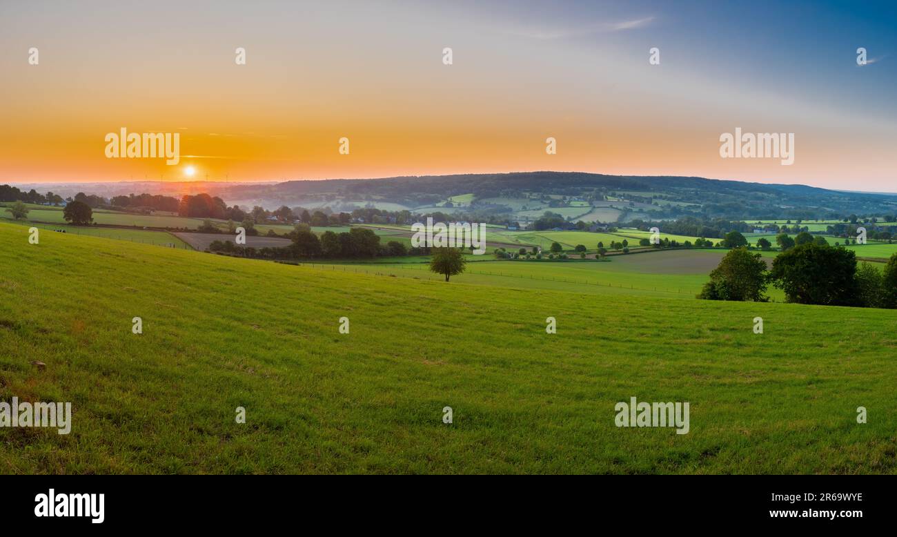 An early morning with a sky full of beautiful colors during sunrise in ...