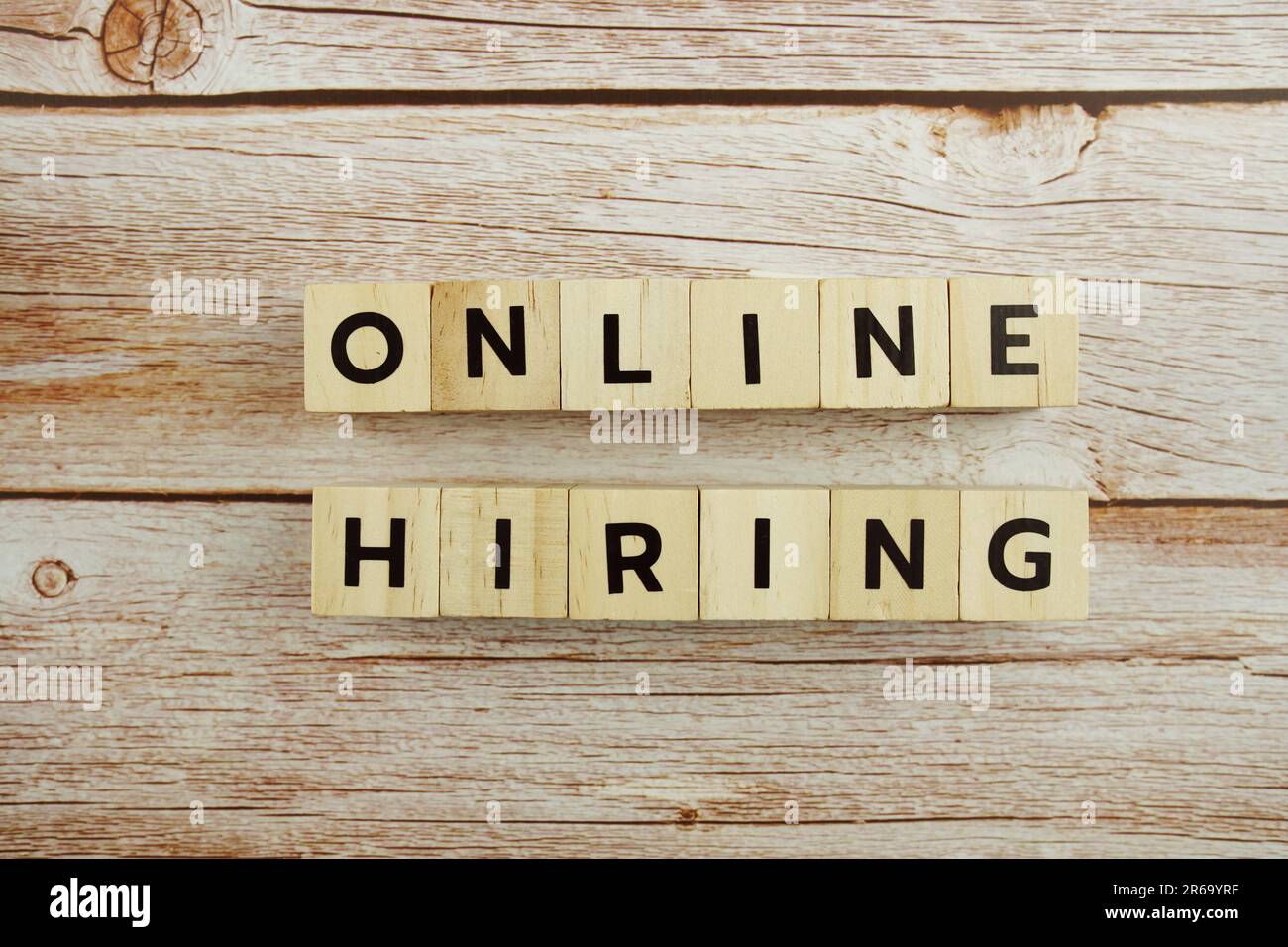 Online Hiring word alphabet letters on wooden background Stock Photo ...