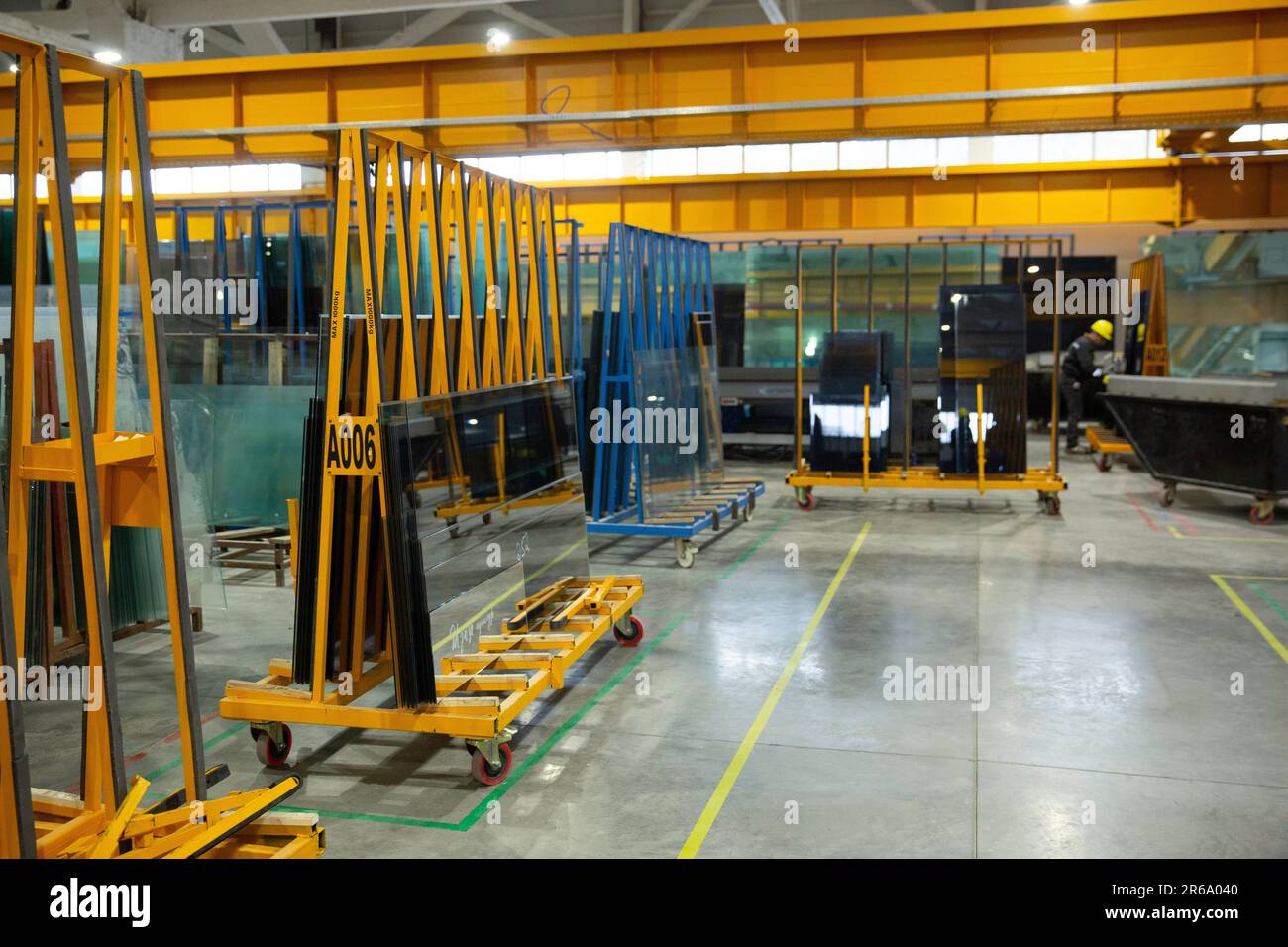 A manufacturing environment producing PVC windows in a factory Stock ...