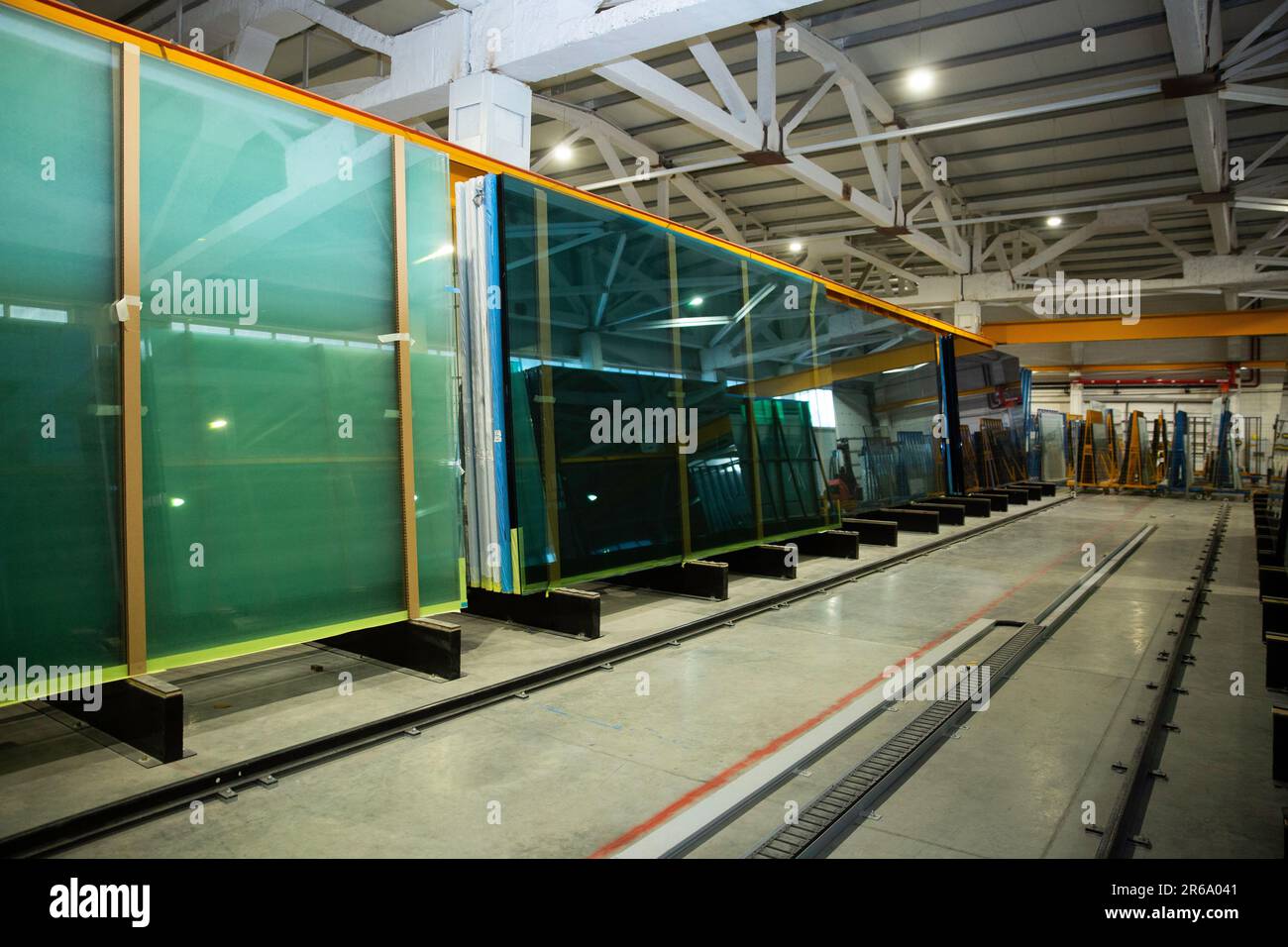 A manufacturing environment producing PVC windows in a factory Stock ...