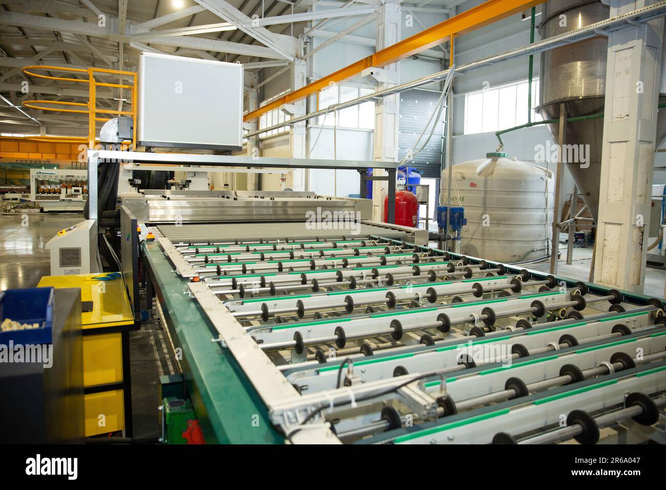 A manufacturing environment producing PVC windows in a factory Stock ...