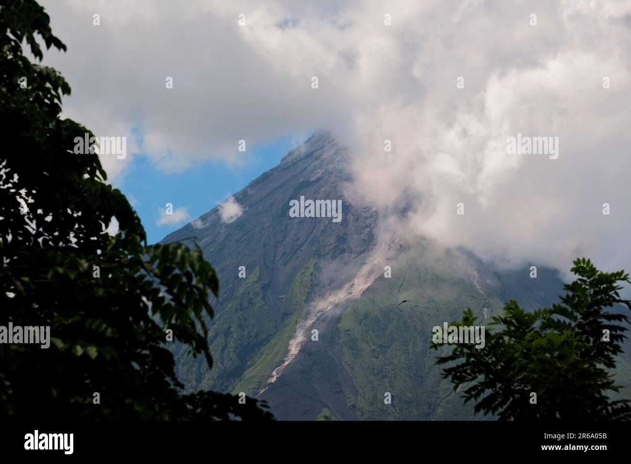 Mayon Volcano spews white smoke as seen from Daraga, Albay province ...