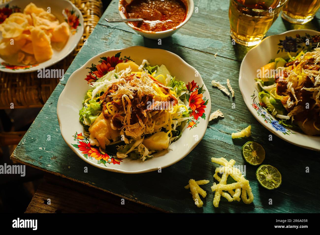 Rujak Juhi. Salad of grilled cuttlefish with vegetables and yellow ...