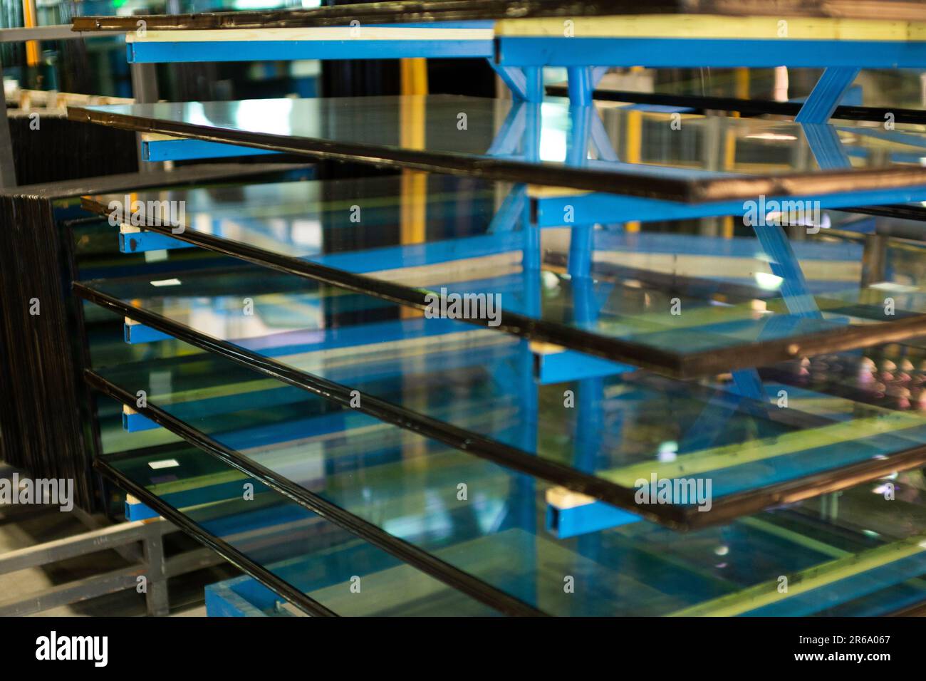 A manufacturing environment producing PVC windows in a factory Stock ...