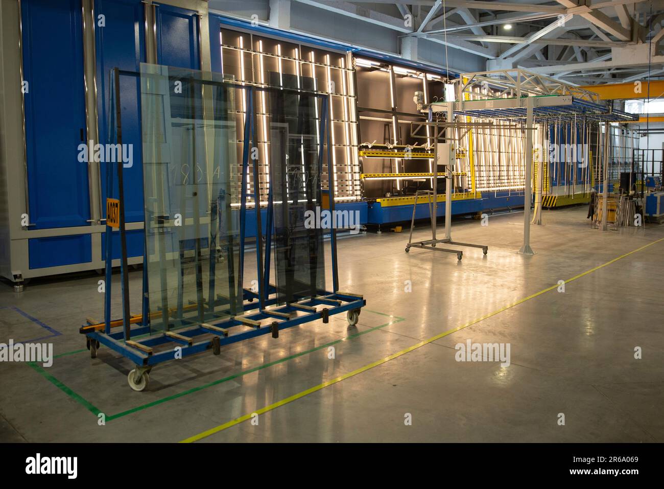 A manufacturing environment producing PVC windows in a factory Stock ...