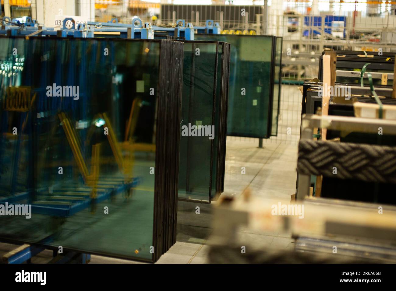 A manufacturing environment producing PVC windows in a factory Stock ...