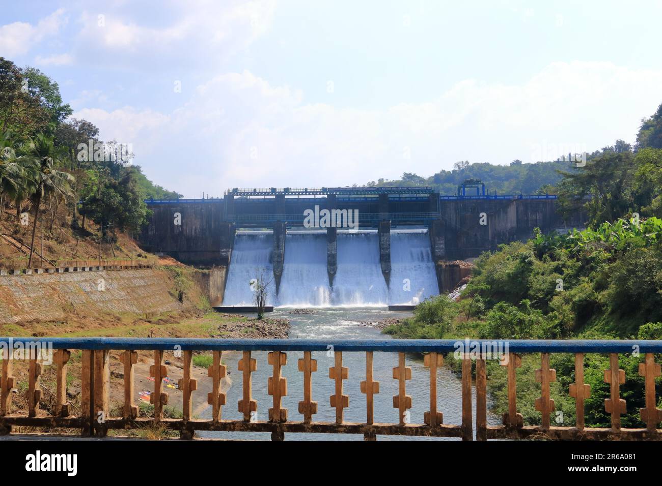 Water rushing through gates at the peruvannamuzhi (peruvannamoozhi) dam ...