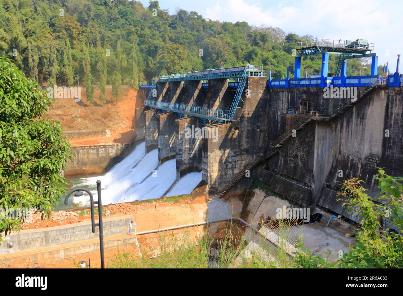 Water rushing through gates at the peruvannamuzhi (peruvannamoozhi) dam ...