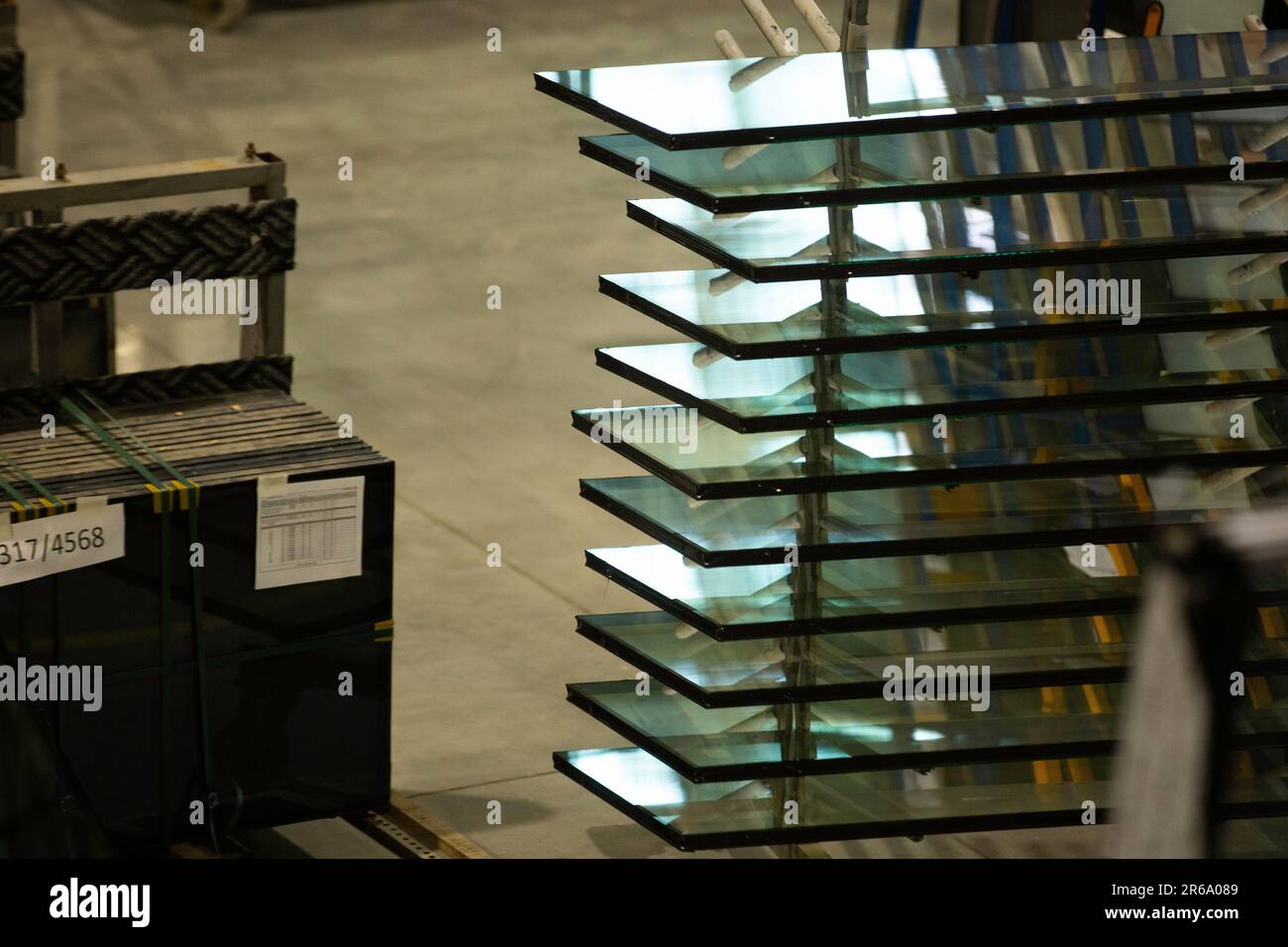 A manufacturing environment producing PVC windows in a factory Stock ...