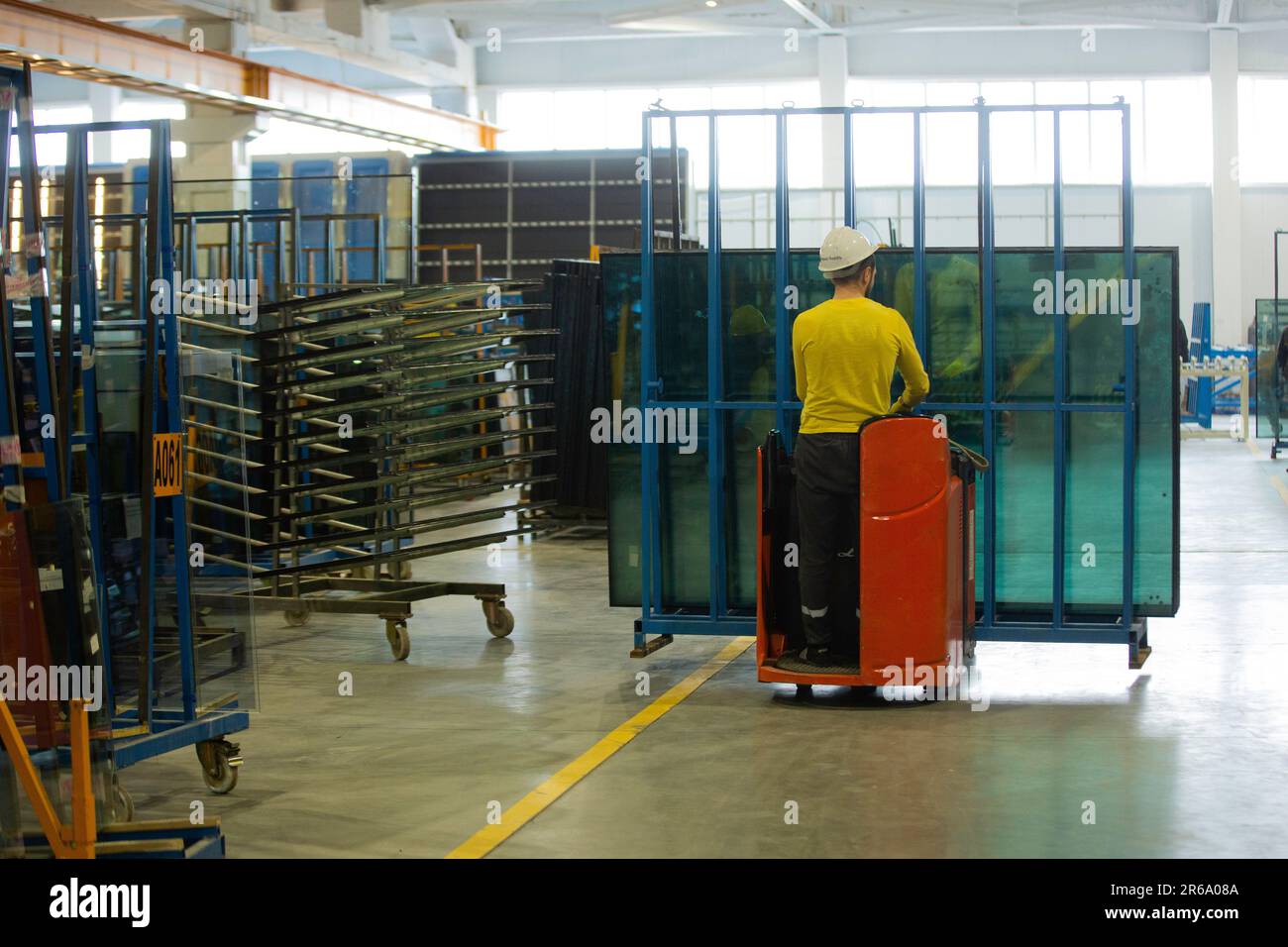 A manufacturing environment producing PVC windows in a factory Stock ...