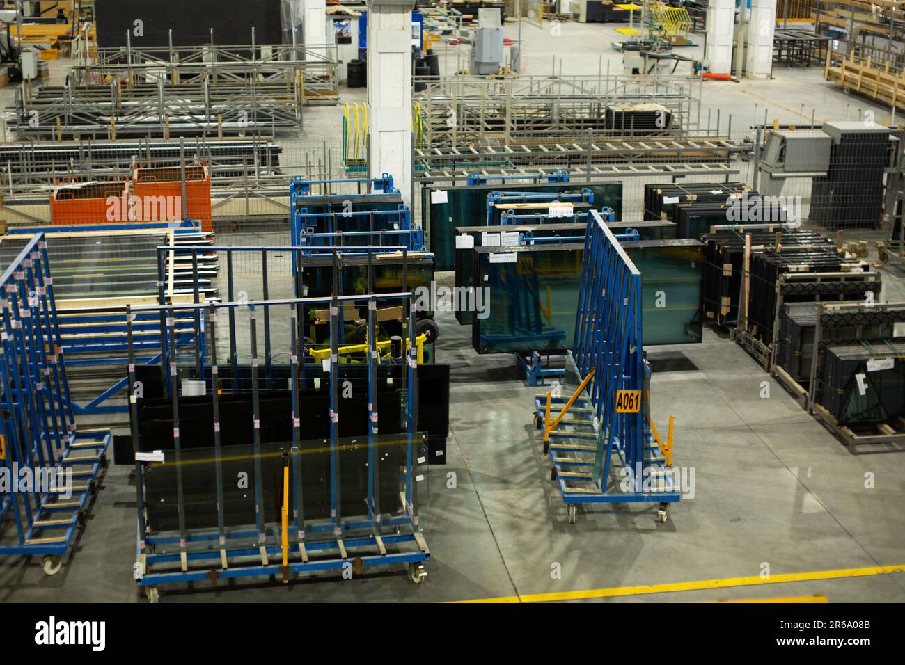 A manufacturing environment producing PVC windows in a factory Stock ...