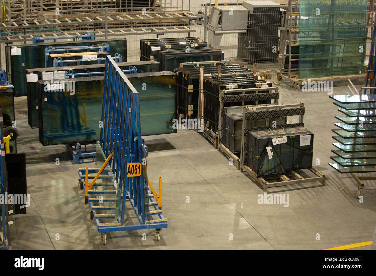 A manufacturing environment producing PVC windows in a factory Stock ...
