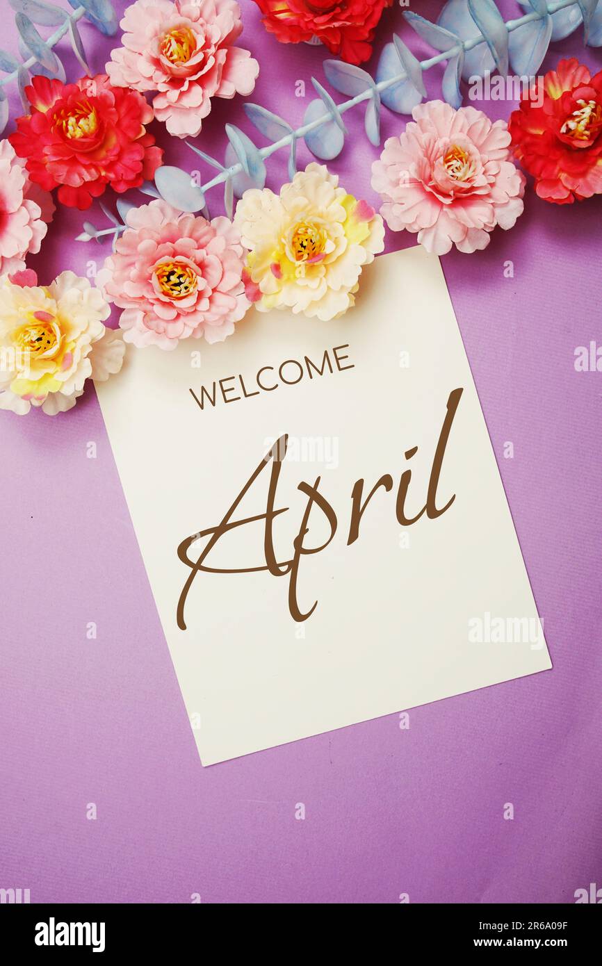 Welcome April typography text and flower decorate on purple background ...