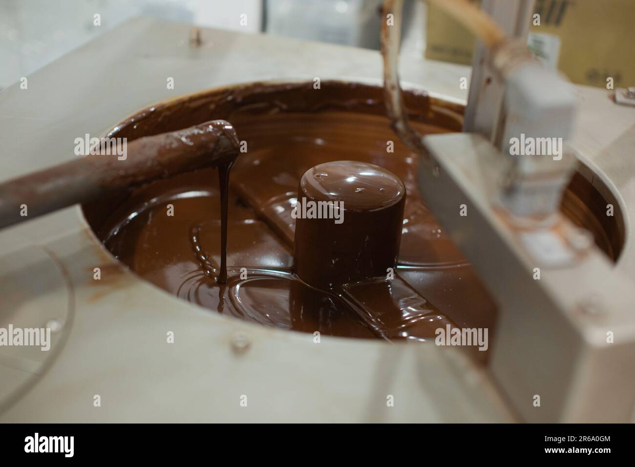 A closeup of the preparation of handmade chocolate candies Stock Photo ...