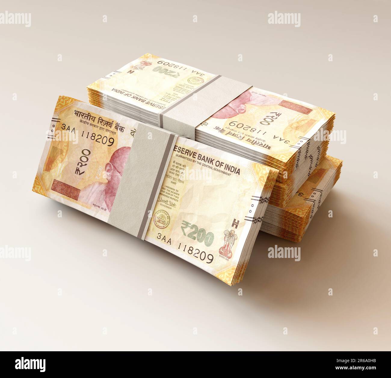 A stack of bundled indian rupee banknotes on an isolated light ...