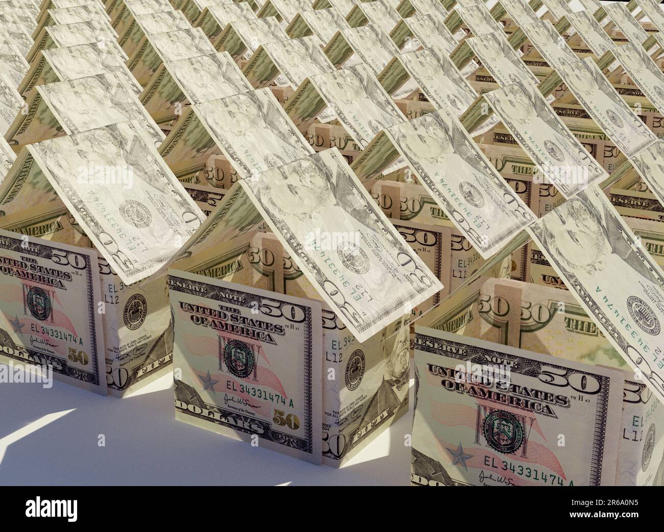 A concept of US dollar bank notes folded into the shape of a mass of ...