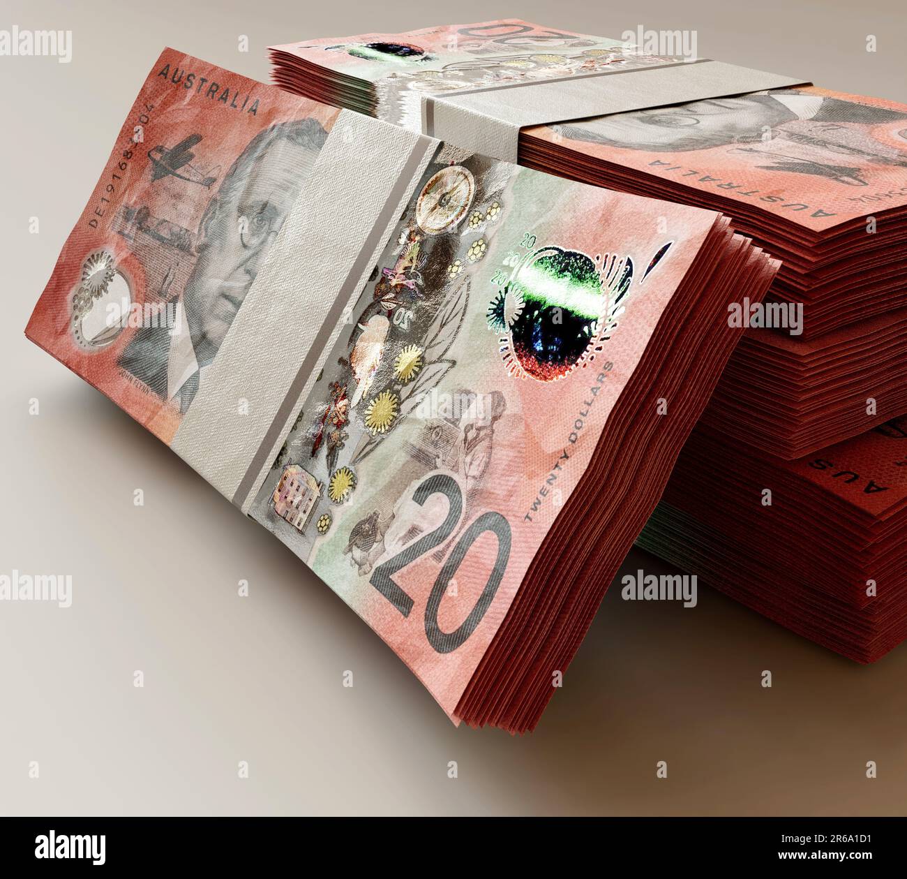A stack of bundled australia dollar banknotes on an isolated light ...