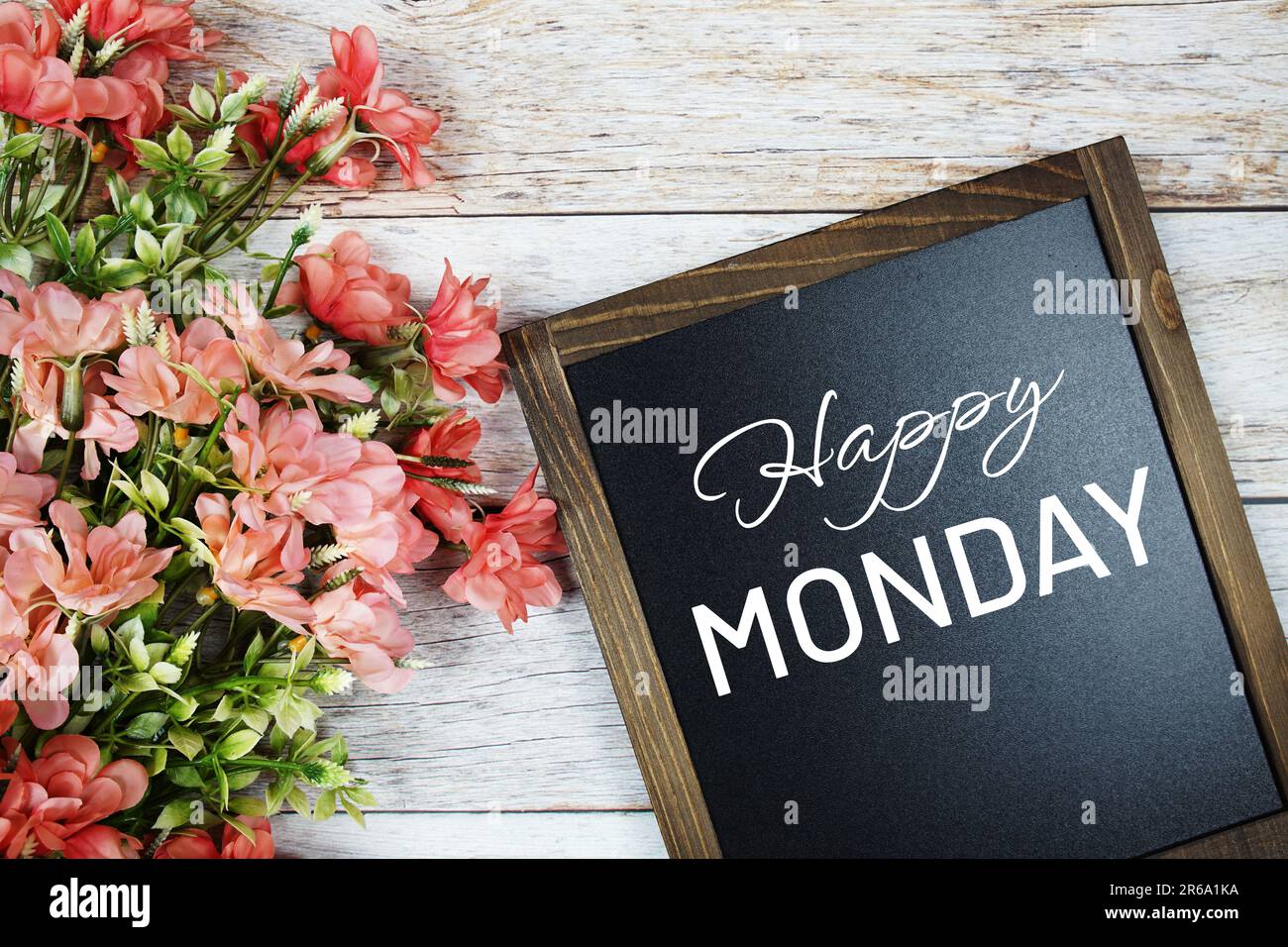 Happy Monday text on blackboard with flower bouquet decoration Stock ...