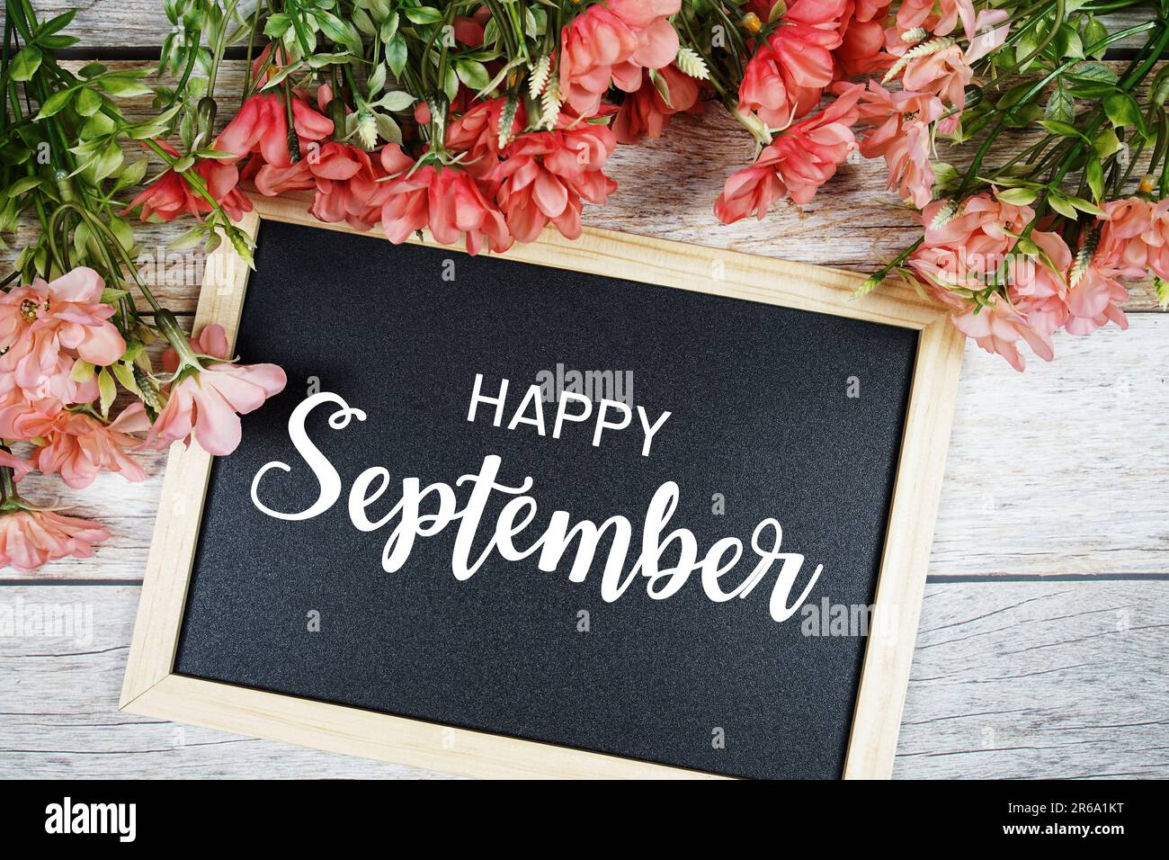 Happy September text on blackboard with flower bouquet decoration Stock ...
