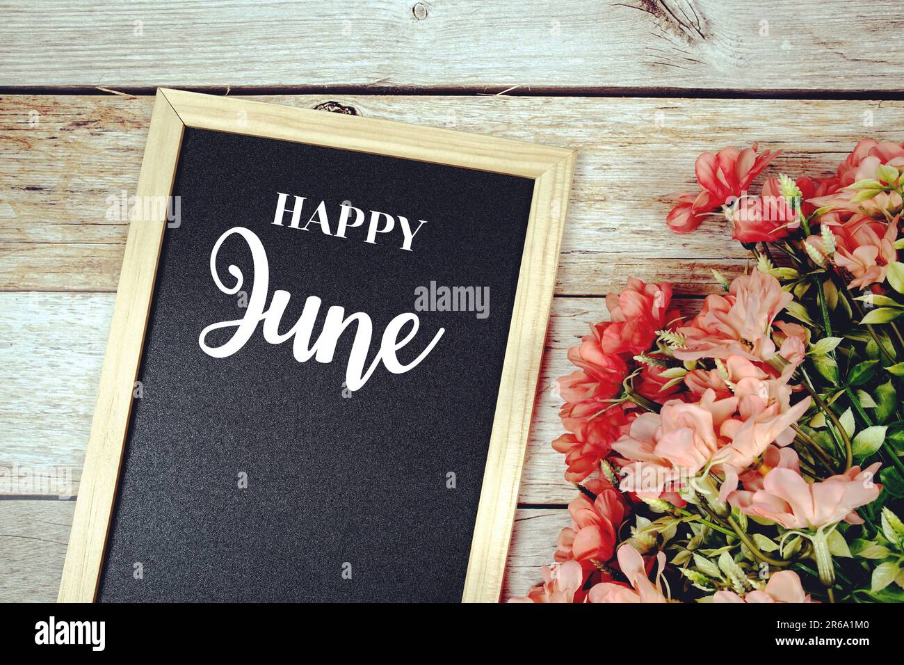 Happy June text on blackboard with flower bouquet decoration Stock ...