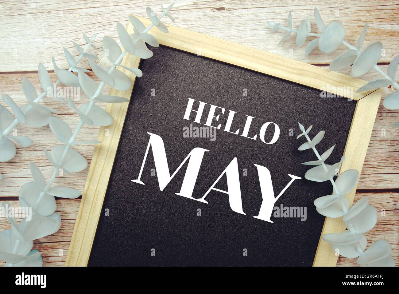 Hello May typography text on blackboard background Stock Photo - Alamy