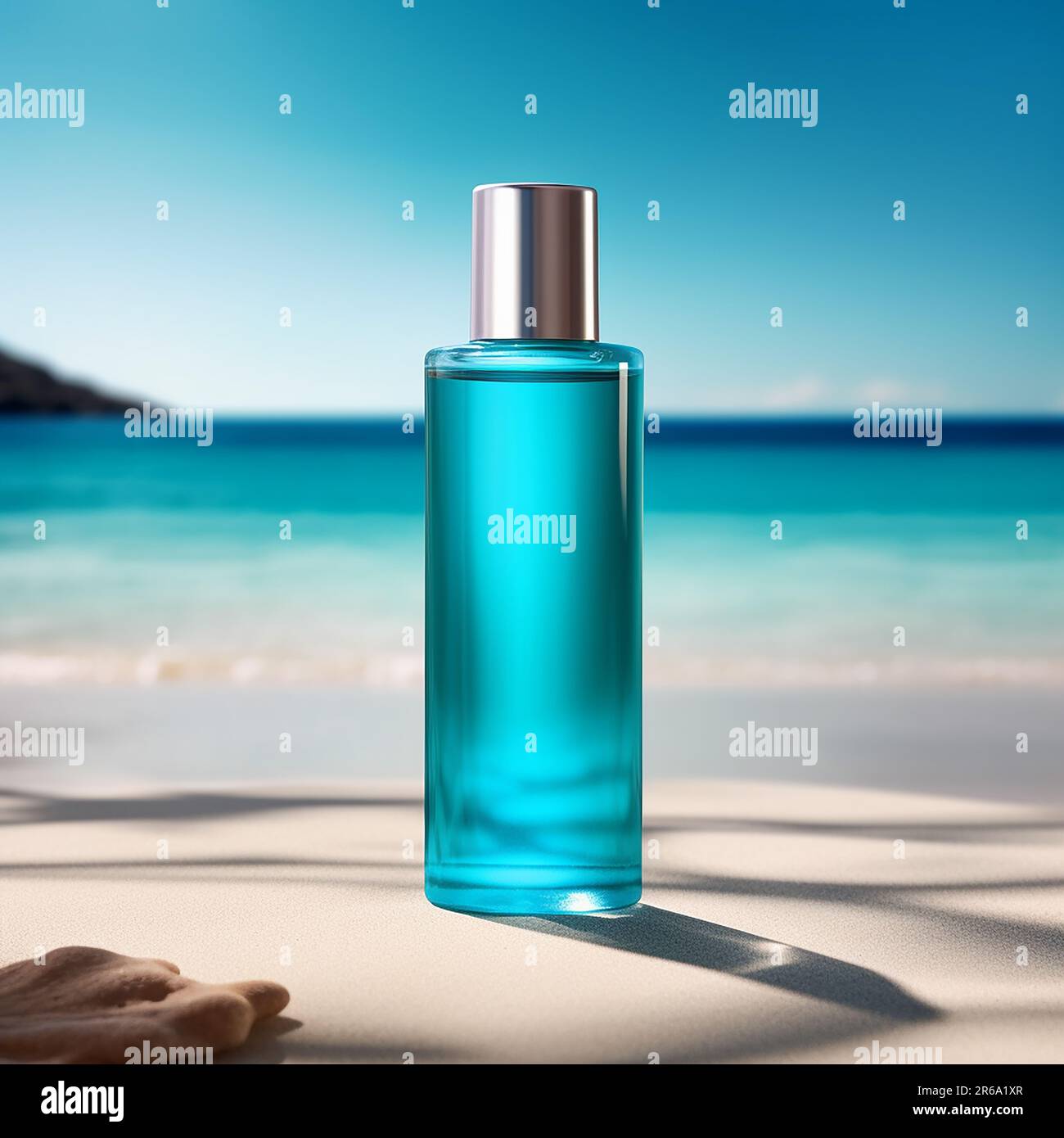 Blue bottle of perfume on sandy beach Stock Photo - Alamy