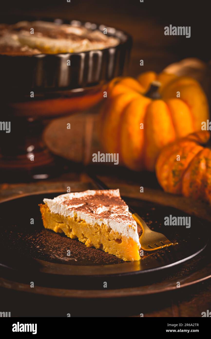 Homemade pumpkin pie with icing for Thanksgiving Stock Photo - Alamy