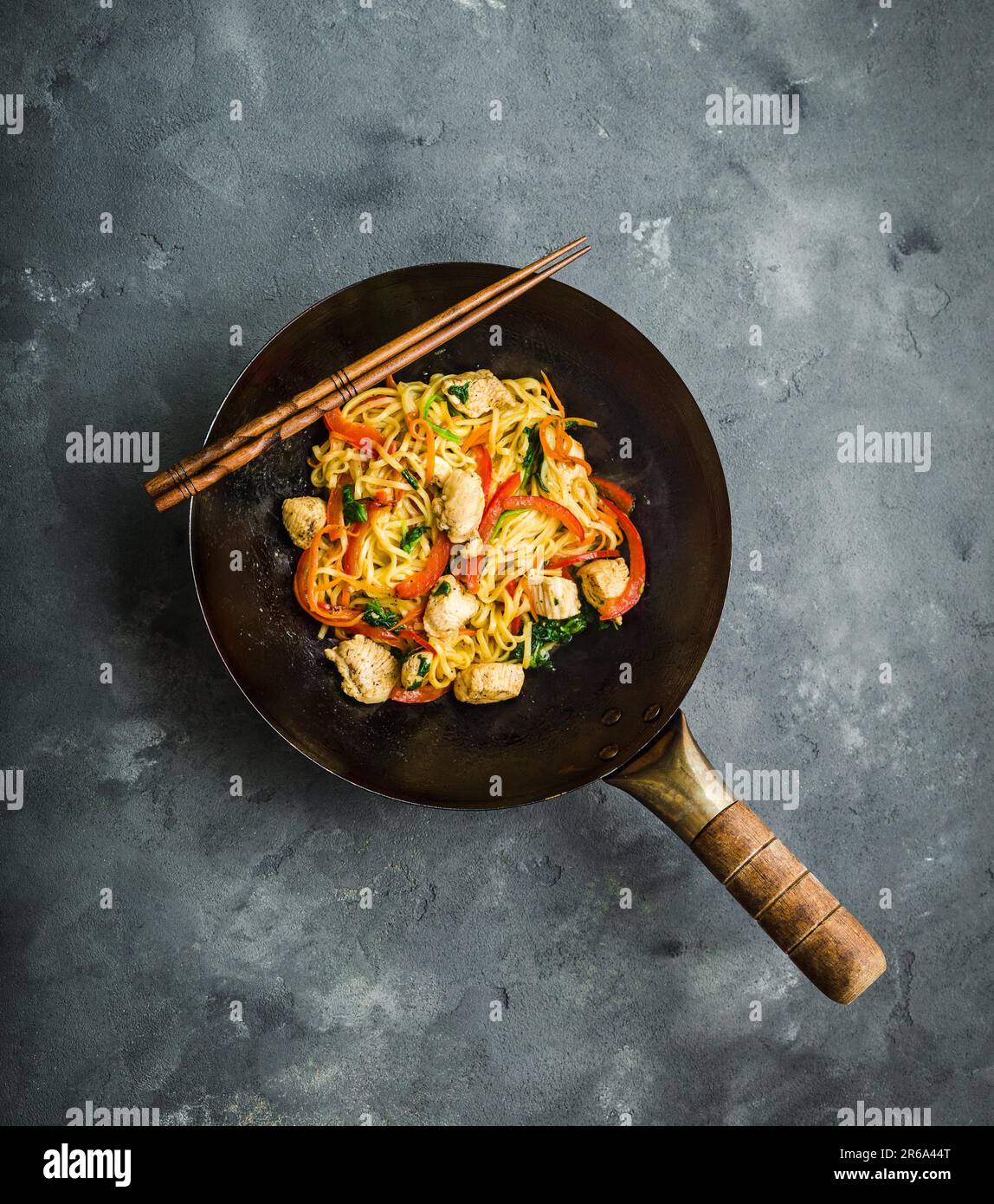 Stir fry noodles, traditional Chinese wok, chopsticks. Asian noodles ...